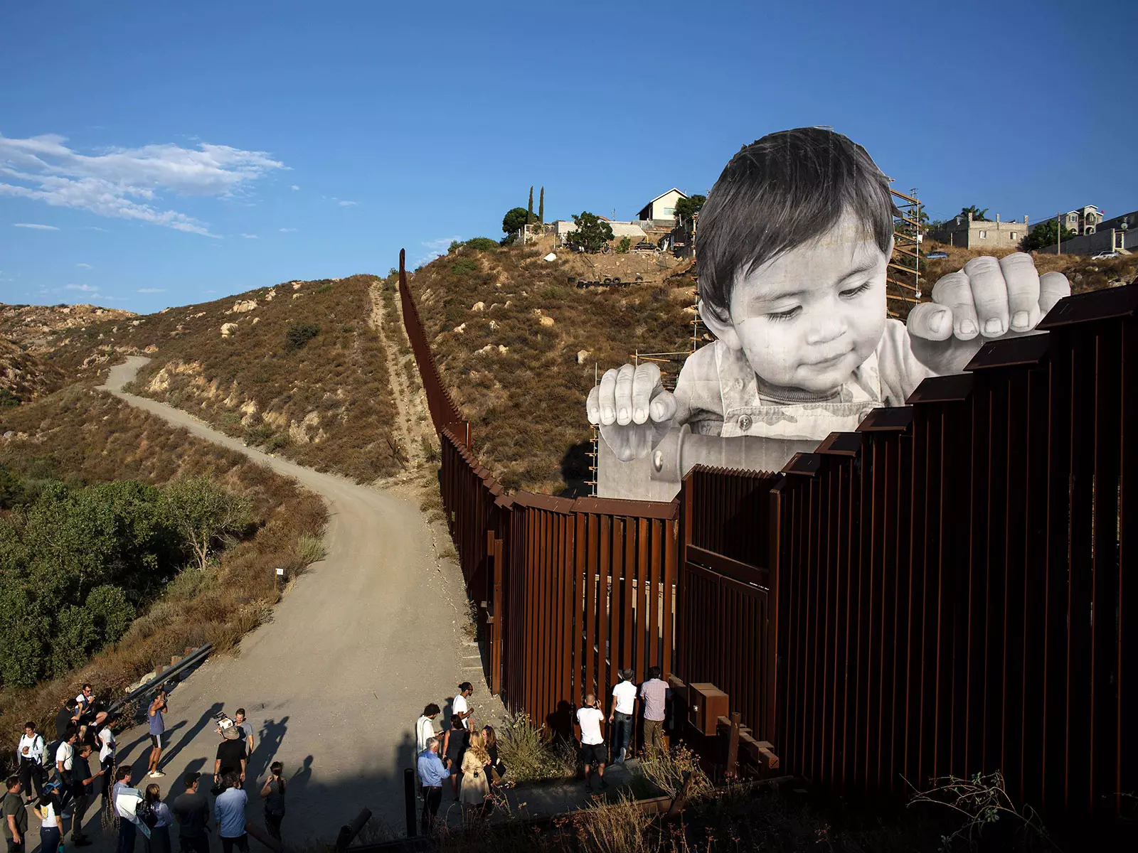 tacate Konschtwierk op der mexikanescher Grenz